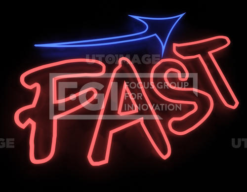 유토이미지 | Fast neon sign isolated on black background