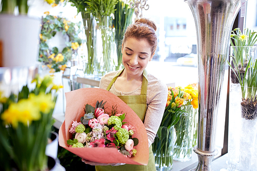 people, business, and floristry concept - happy smiling florist woman ...