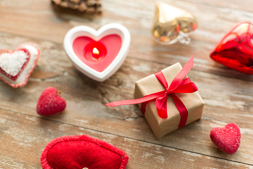 christmas, valentines day and holidays concept - gift box with heart ...