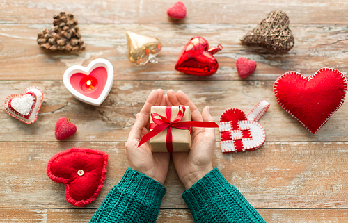 christmas, valentines day and holidays concept - female hands holding ...