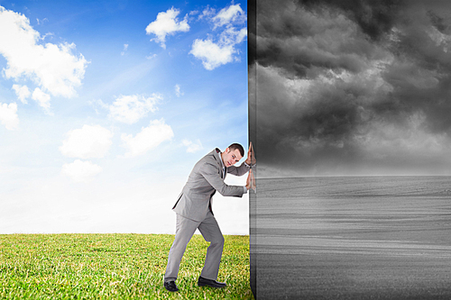 유토이미지 | Composite image of businessman pushing away scene