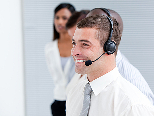 Confident customer service representatives standing in a line | 유토이미지 ...