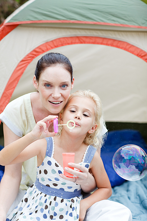 유토이미지 | Mother and daughter together in tent