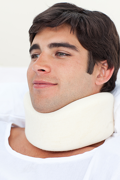 Close up of a young male patient wearing a neck brace | 유토이미지 | 상세페이지 ...