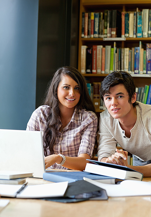 Portrait of good looking students working together | 유토이미지 | 상세페이지 ...