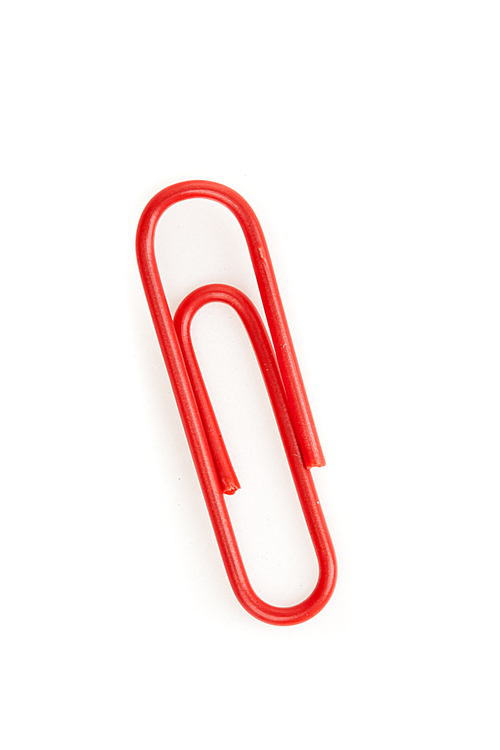 유토이미지 | Close up of a red paperclip on the floor