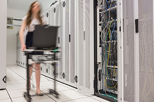 Woman pushing computer to open servers | 유토이미지 | 상세페이지 | 베이직샵 | 사진 ...