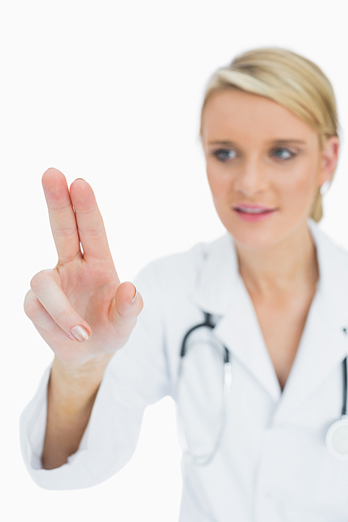 유토이미지 Doctor Touching On Something With Two Fingers