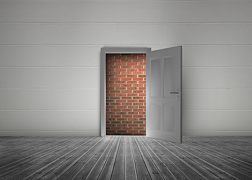 유토이미지 | Door open to reveal red brick wall blocking the way