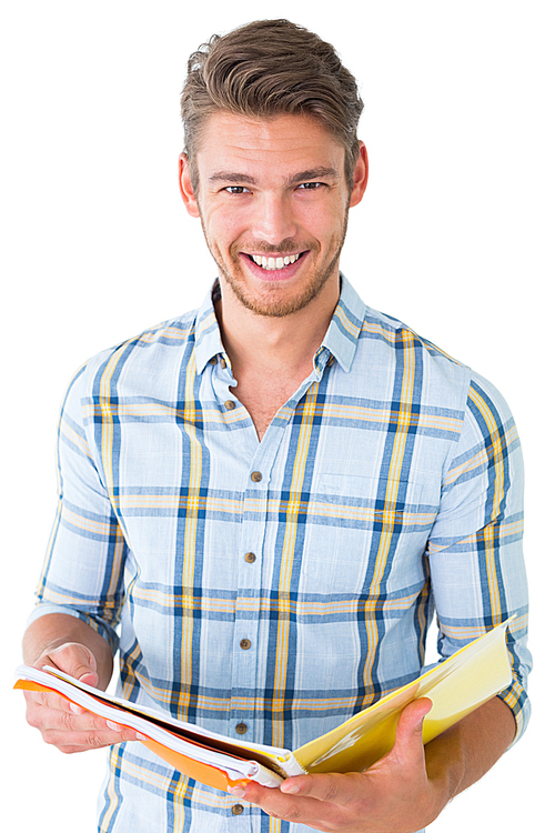 유토이미지 | Handsome student reading from notepad