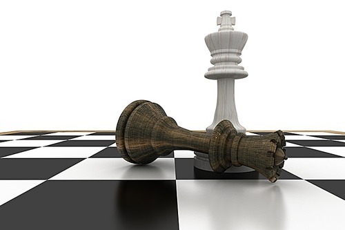 유토이미지 | White king standing over fallen black queen