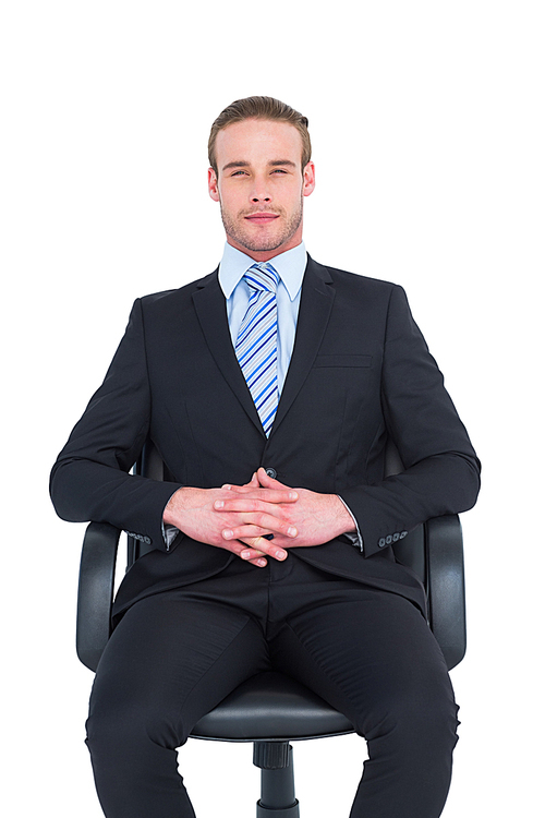 Stern businessman sitting on an office chair | 유토이미지 | 상세페이지 | 베이직샵 ...