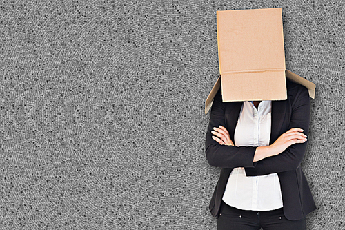 유토이미지 | Composite image of businesswoman with box over head