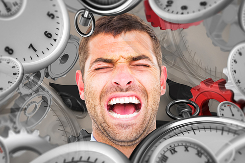 유토이미지 | Businessman screaming against grey background with vignette