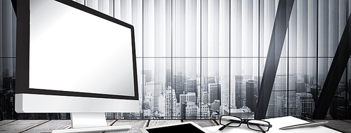 유토이미지 | Computer screen against window overlooking citty