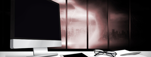 유토이미지 | Computer screen against window overlooking city