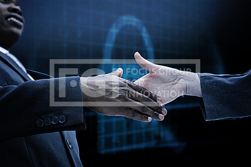 유토이미지 | Businessman going shaking a hand against digital security lock