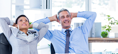 유토이미지 | Business people relaxing in swivel chair in office