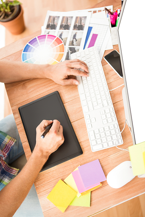Casual designer using computer and digitizer in the office | 유토이미지 | 상세 ...