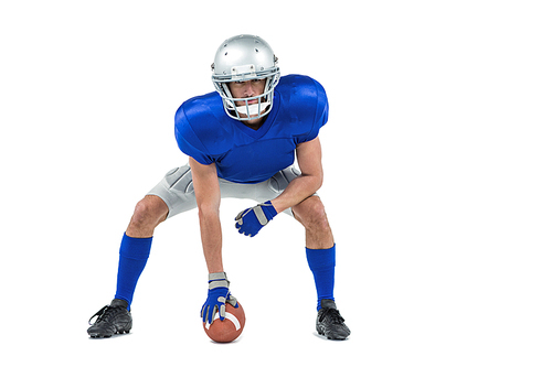 유토이미지 | Portrait of alert American football player in attack stance ...