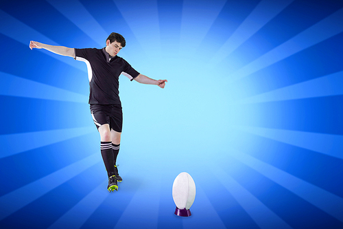 유토이미지 | Composite image of rugby player doing a drop kick