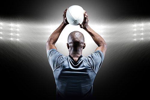 유토이미지 | Composite image of athlete throwing rugby ball