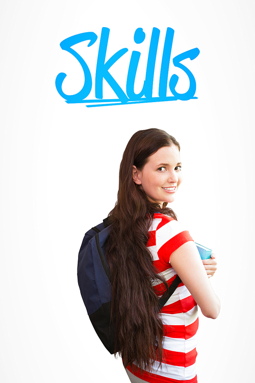 유토이미지 | The word skills and student smiling at camera in library ...