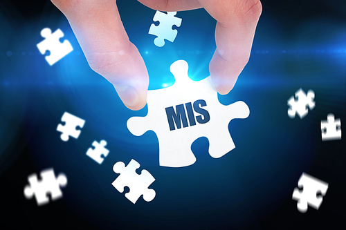 유토이미지 | The word mis and hand holding jigsaw piece against blue ...