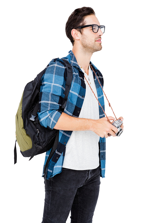 유토이미지 | Young man carrying rucksack and holding camera on white background