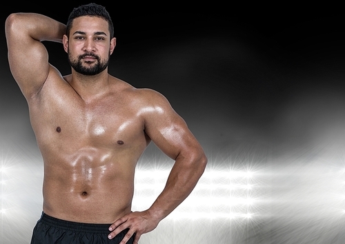 Smart muscular man posing against black illuminated background | 유토이미지 ...
