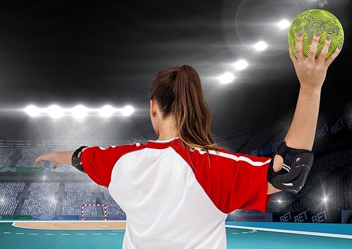 유토이미지 | Digital composite image of female athlete throwing handball ...