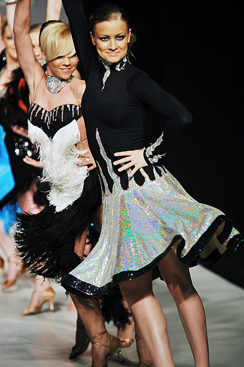 fashion show event and beautiful young woman at piste walking in luxury ...