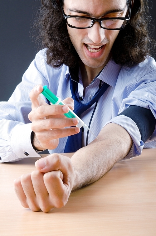 유토이미지 | Young druc addict with syringe