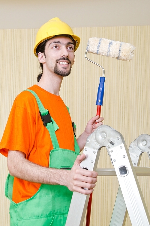 유토이미지 | Painter worker during painting job