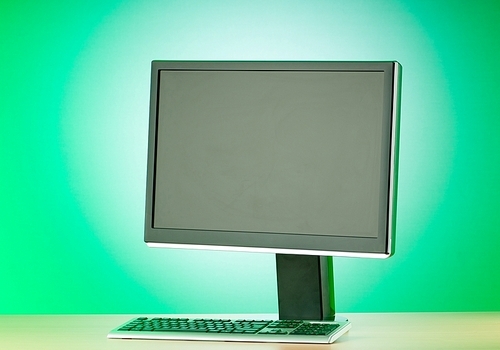 유토이미지 | Wide screen computer monitor against colorful background