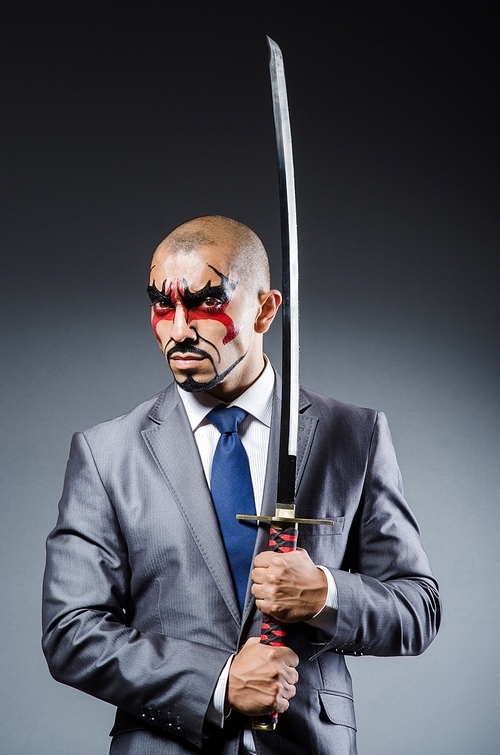 유토이미지 | Man with face paint and sword