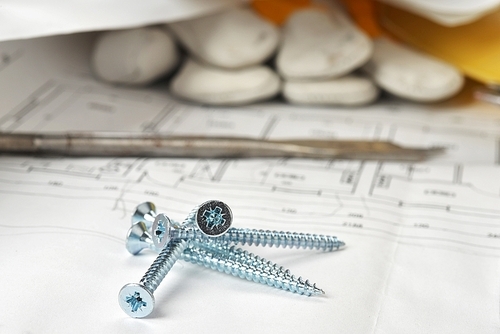 유토이미지 | project drawings and tools on table