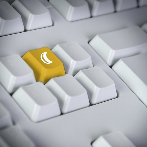 유토이미지 | detail of keyboard with key showing moon
