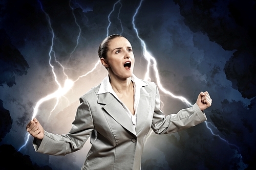 businesswoman in anger screaming against lightning background | 유토이미지 ...