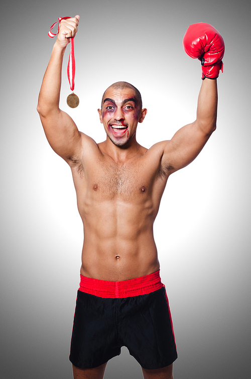 유토이미지 | Badly beaten boxer isolated on white