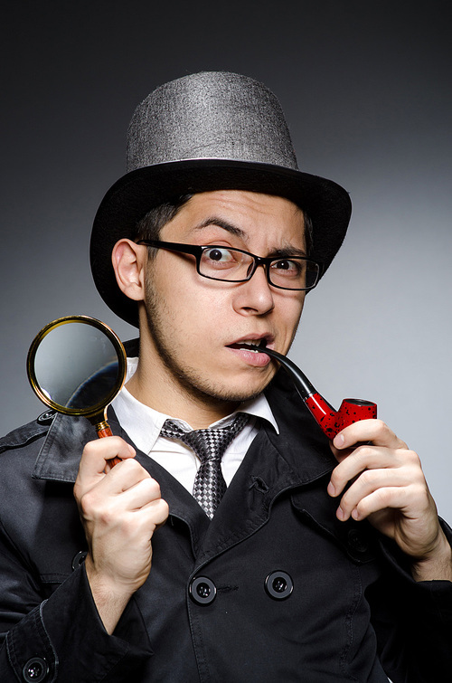 유토이미지 | Funny detective with pipe and hat