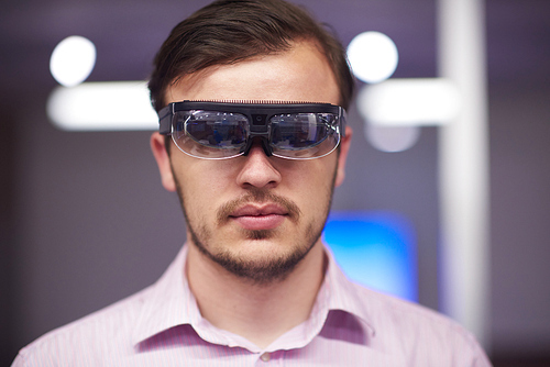 유토이미지 | young man using virtual reality gadget computer technology glasses