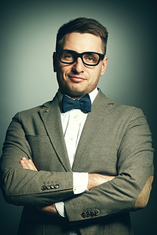 Confident nerd in eyeglasses and bow tie against grey background | 유토이미지 | 상세페이지 | 베이직샵 | 사진 ...