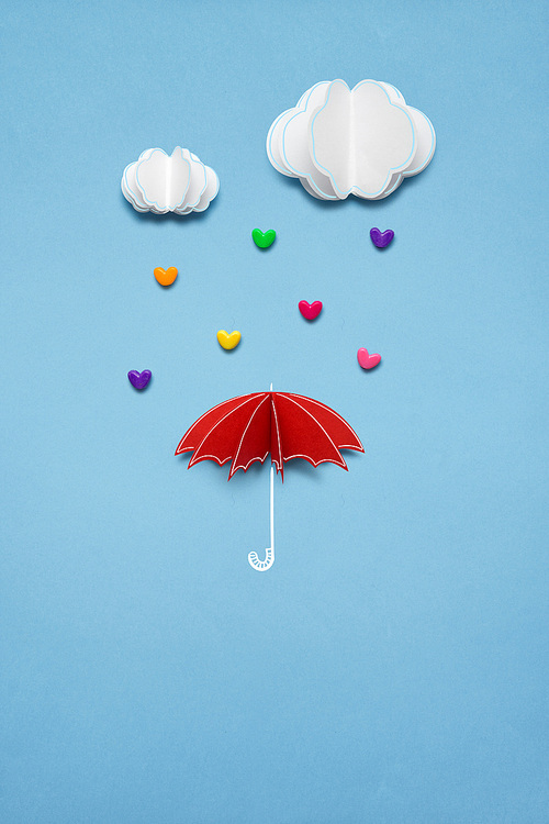 Creative valentines concept photo of umbrella with hearts raining down ...