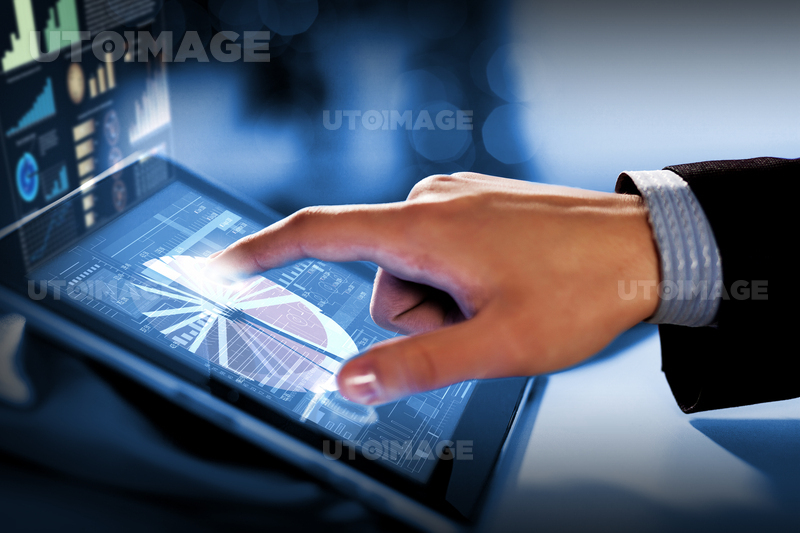 Close up of finger touching blue toned screen on tablet pc | 유토이미지 | 상세 ...