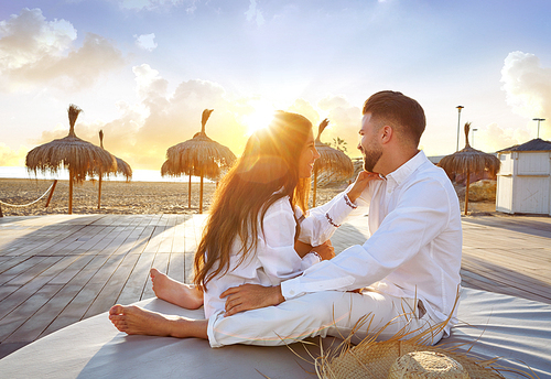 유토이미지 | Couple young in love hug on the beach vacation sunrise at Spain