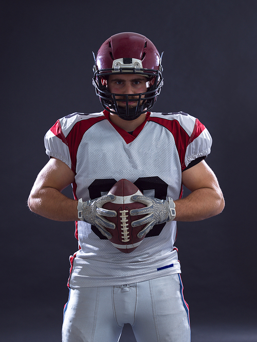 유토이미지 | Portrait of a strong muscular American Football Player isolated ...