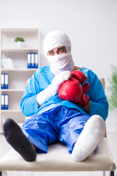 유토이미지 | Injured boxer recovering in hospital