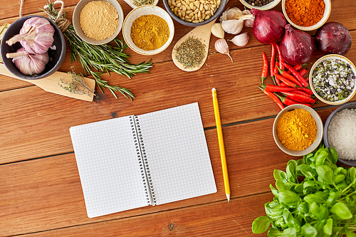 food, culinary and eating concept - notebook with pencil among ...