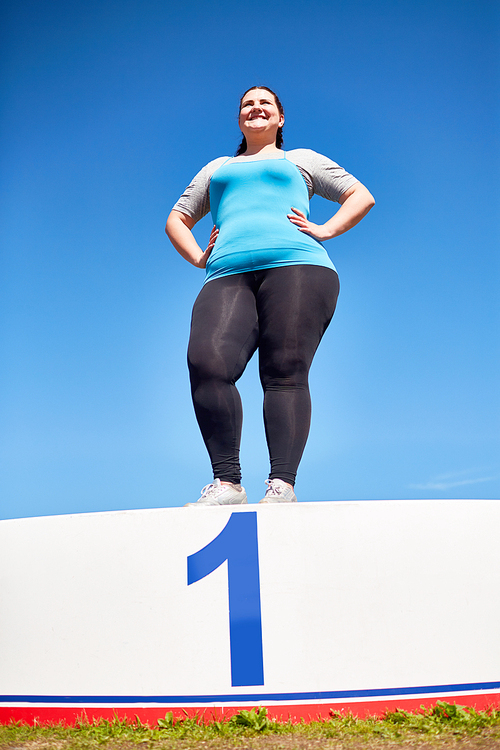 유토이미지 | Winner in over-size people competition standing on first place ...